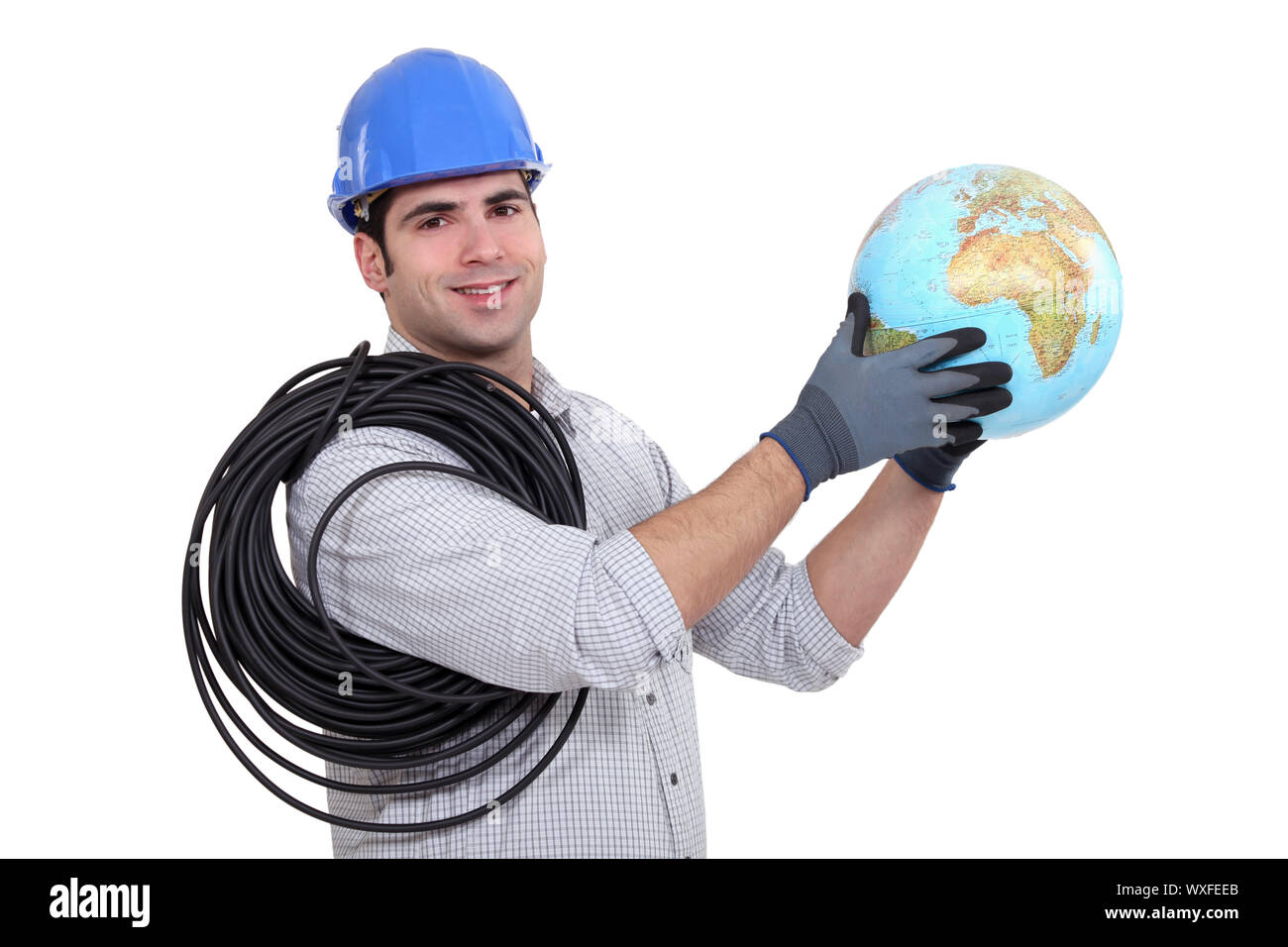 Helmeted worker hi-res stock photography and images - Alamy