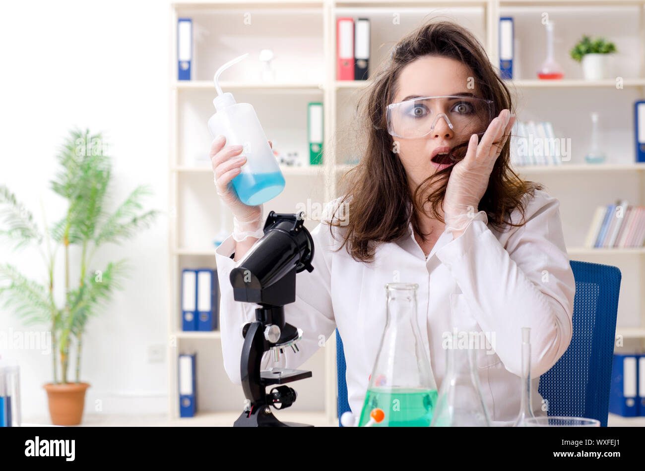 Funny female scientist hi-res stock photography and images - Alamy