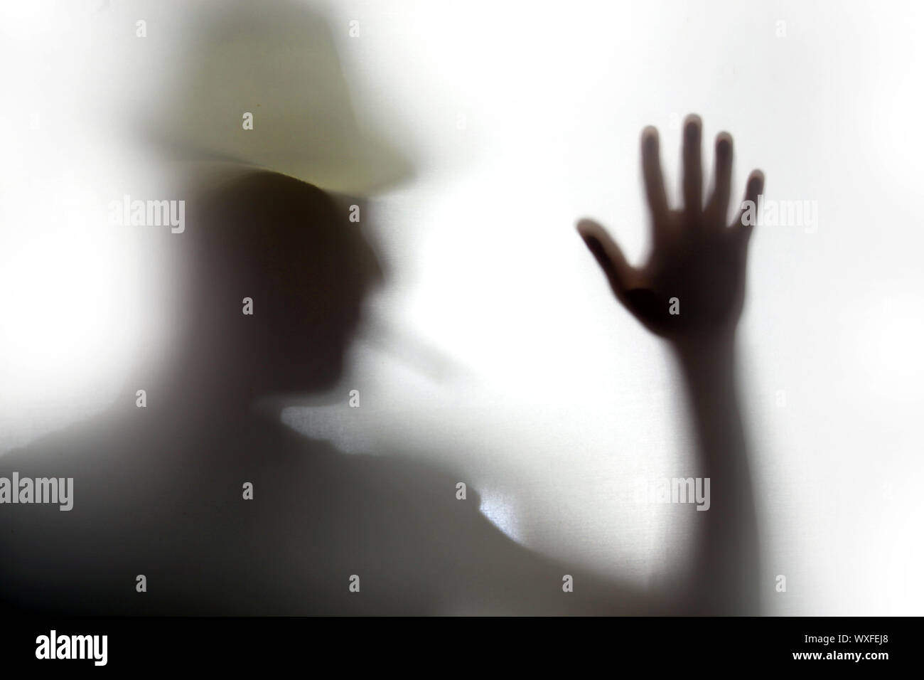 Construction worker's shadow Stock Photo - Alamy