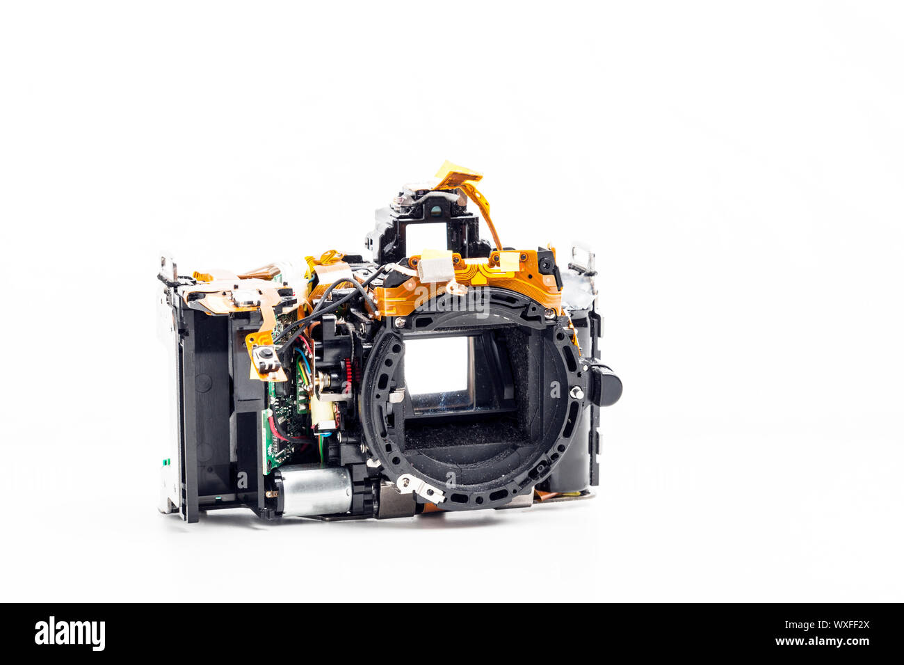 Picture of a disassembled photo camera on white background Stock Photo ...