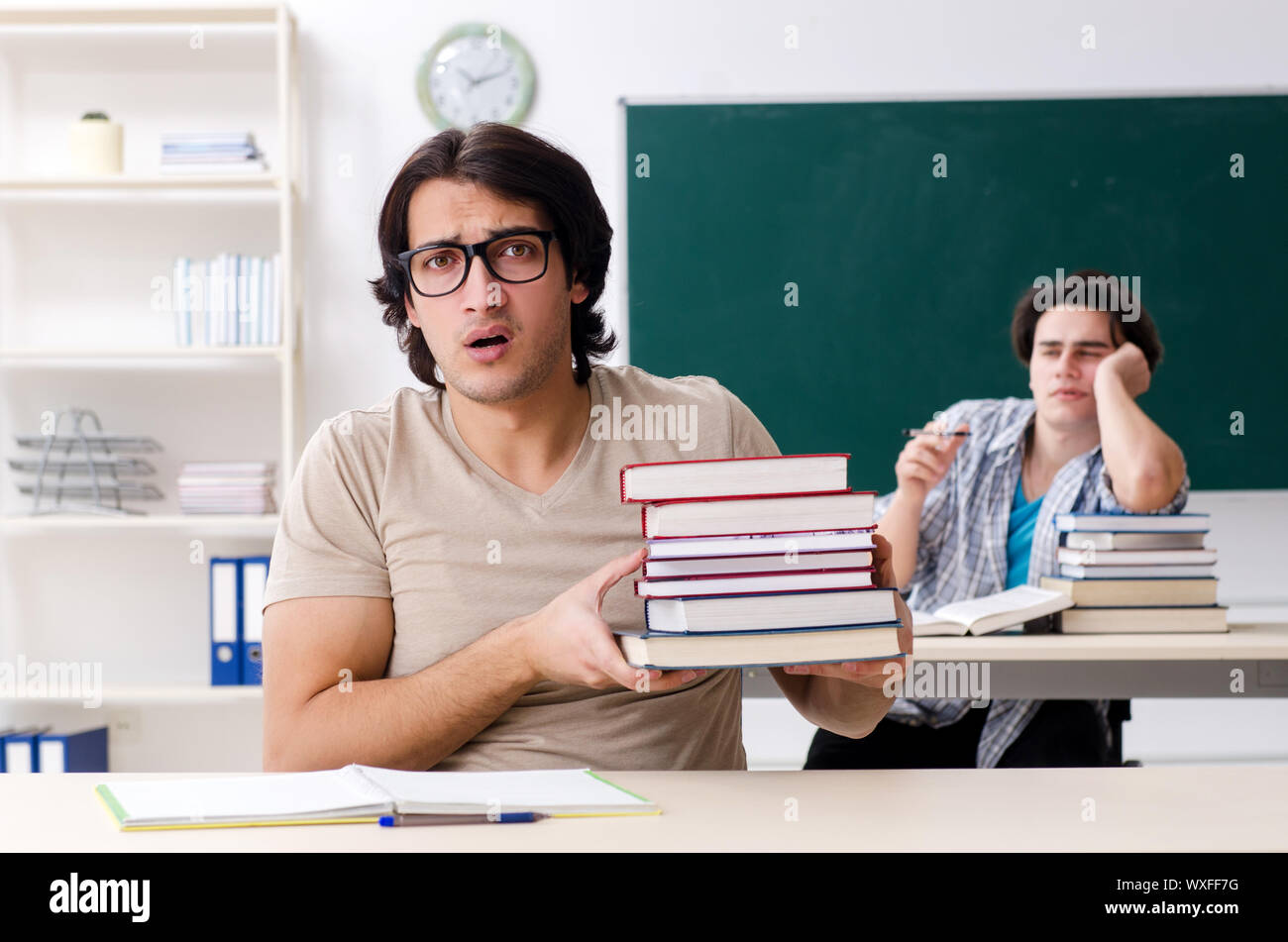 Two male students in the classroom Stock Photo - Alamy