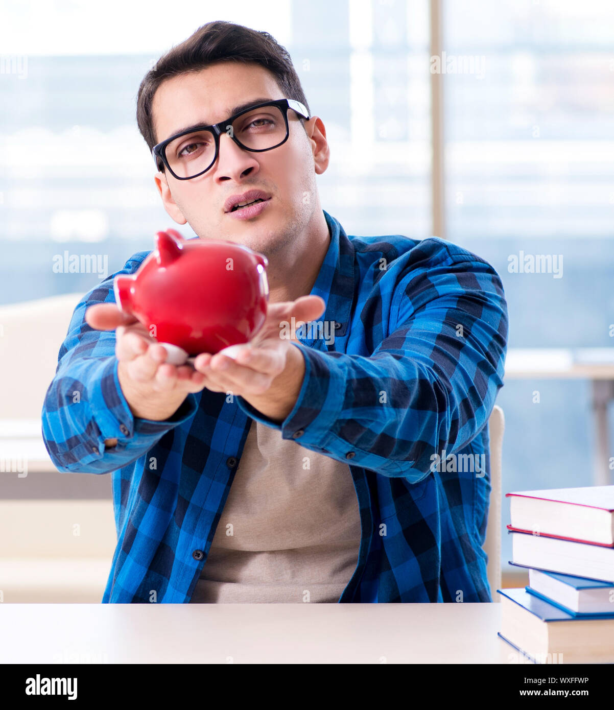 Concept of expensive textbooks and cost of education Stock Photo - Alamy