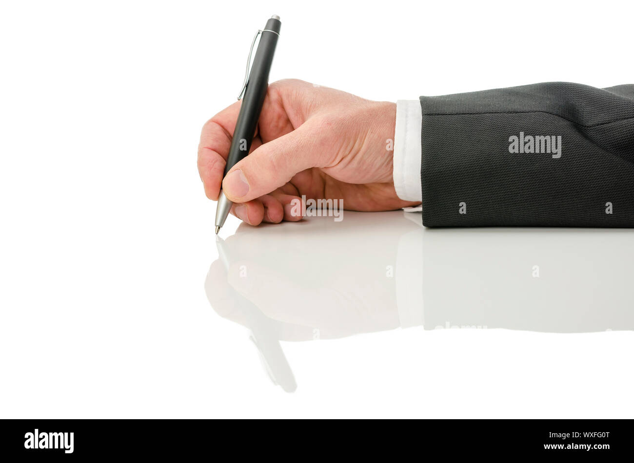 Male hand holding a pen. Isolated over white background with reflection ...