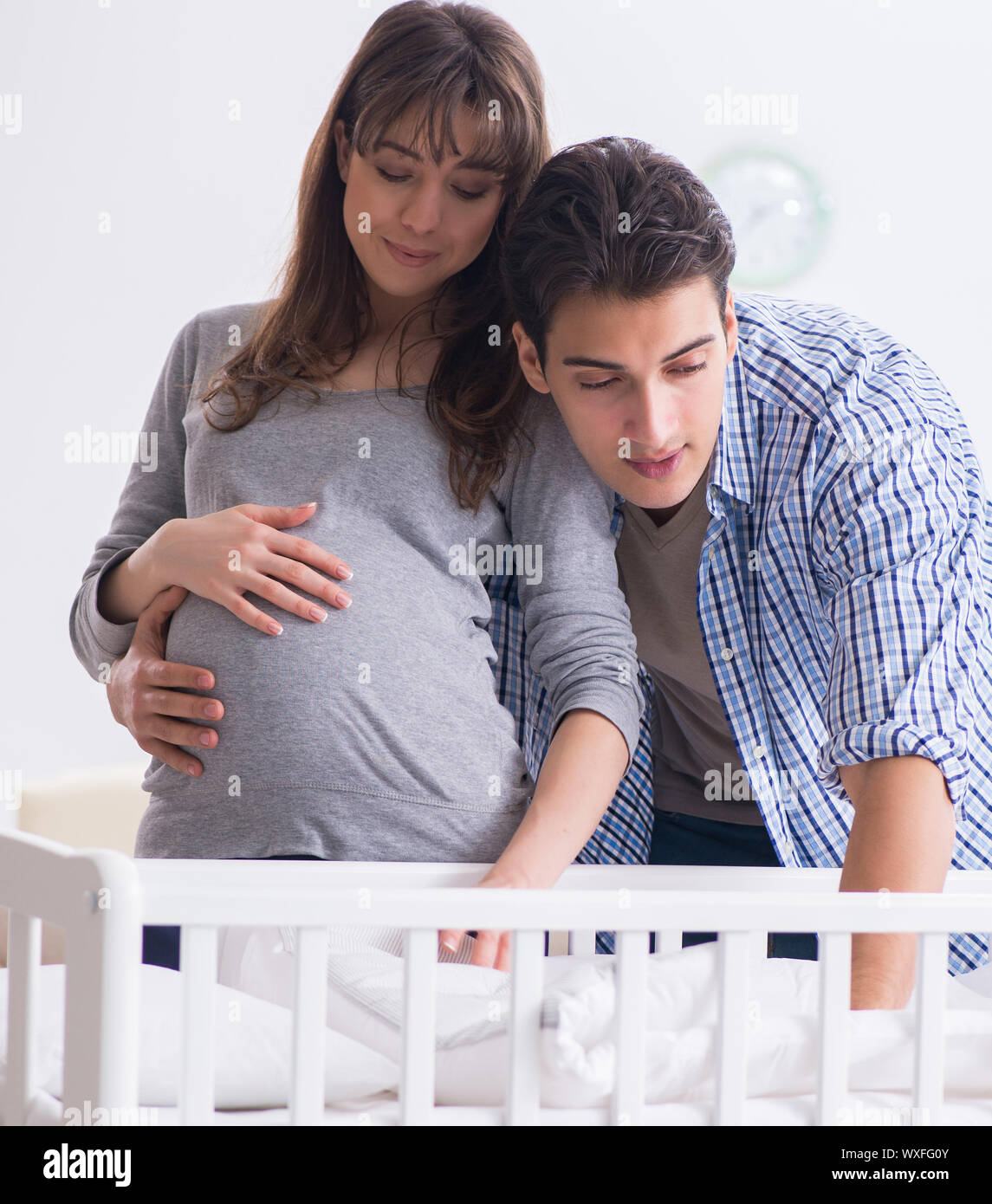 Young parents expecting their first baby Stock Photo - Alamy