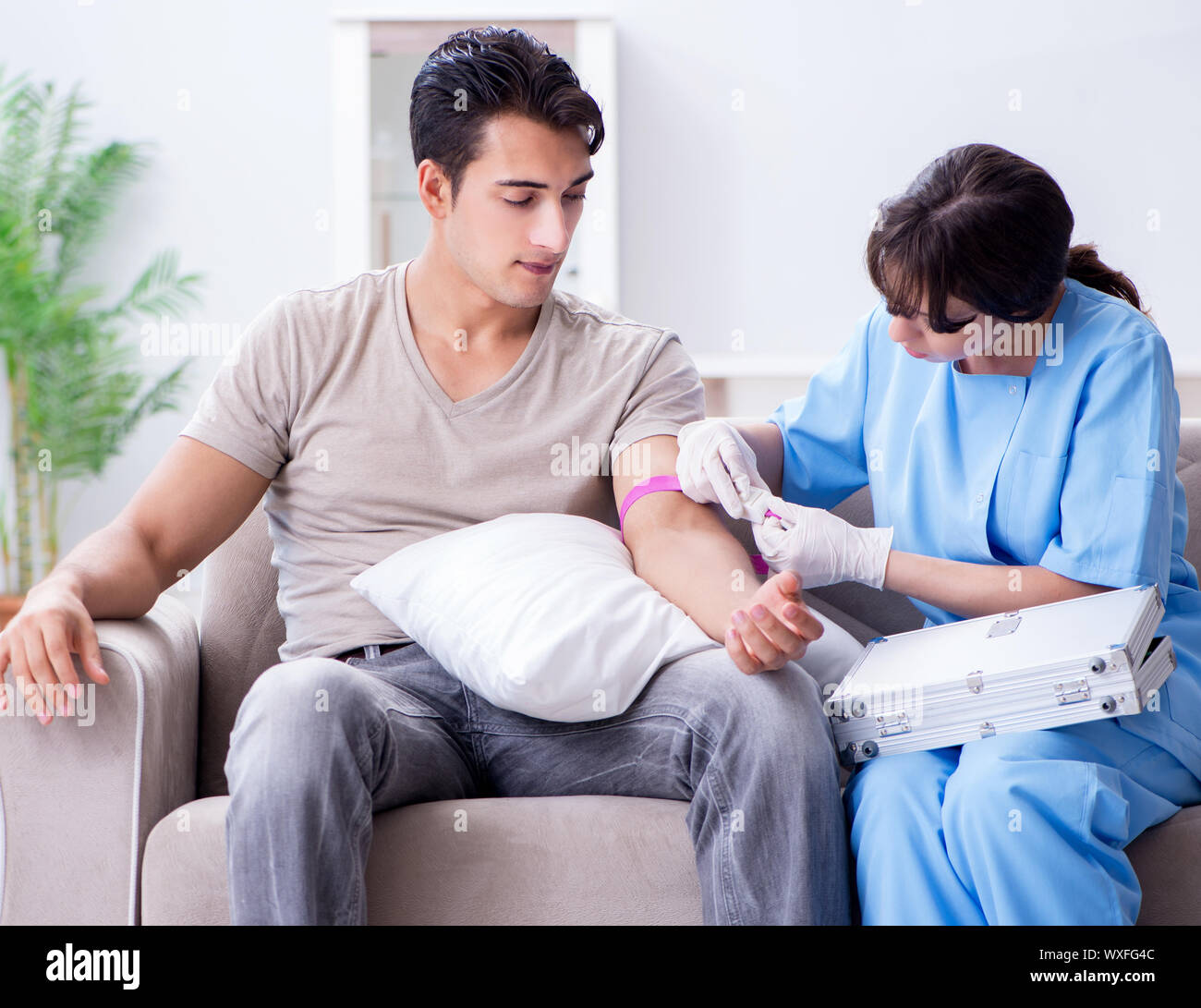 Patient getting blood transfusion in hospital clinic Stock Photo - Alamy