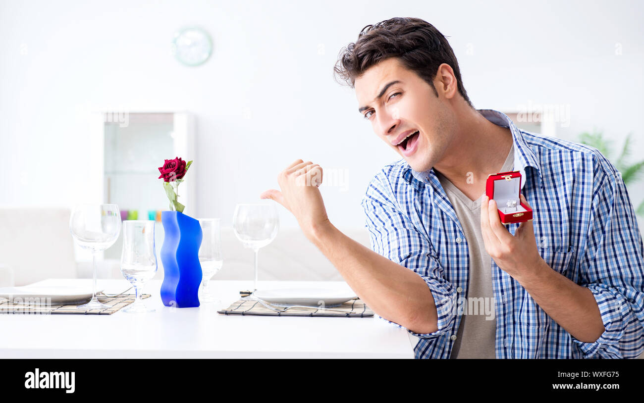 Man alone preparing for romantic date with his sweetheart Stock Photo ...