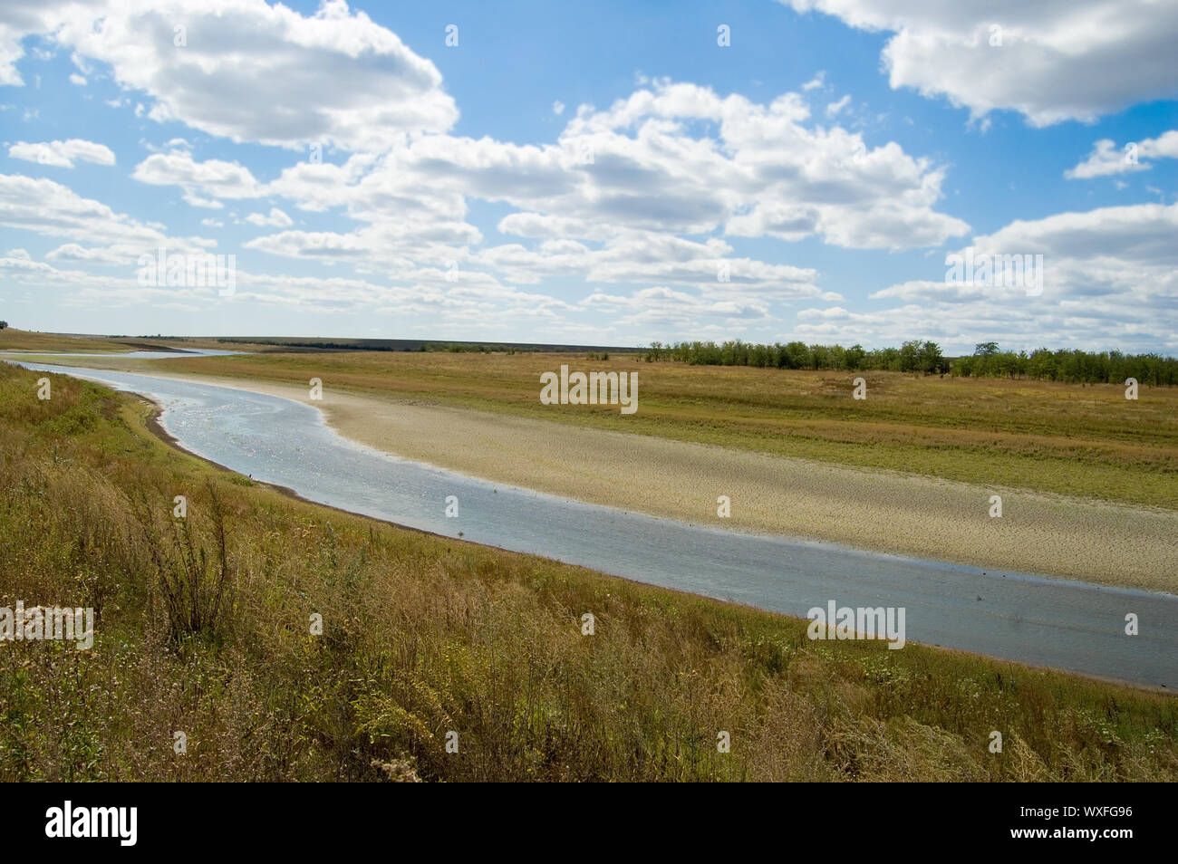 view of steppe river with clouds in the background Stock Photo - Alamy
