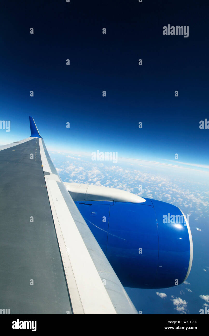Around the earth in an airplane hi-res stock photography and images - Alamy