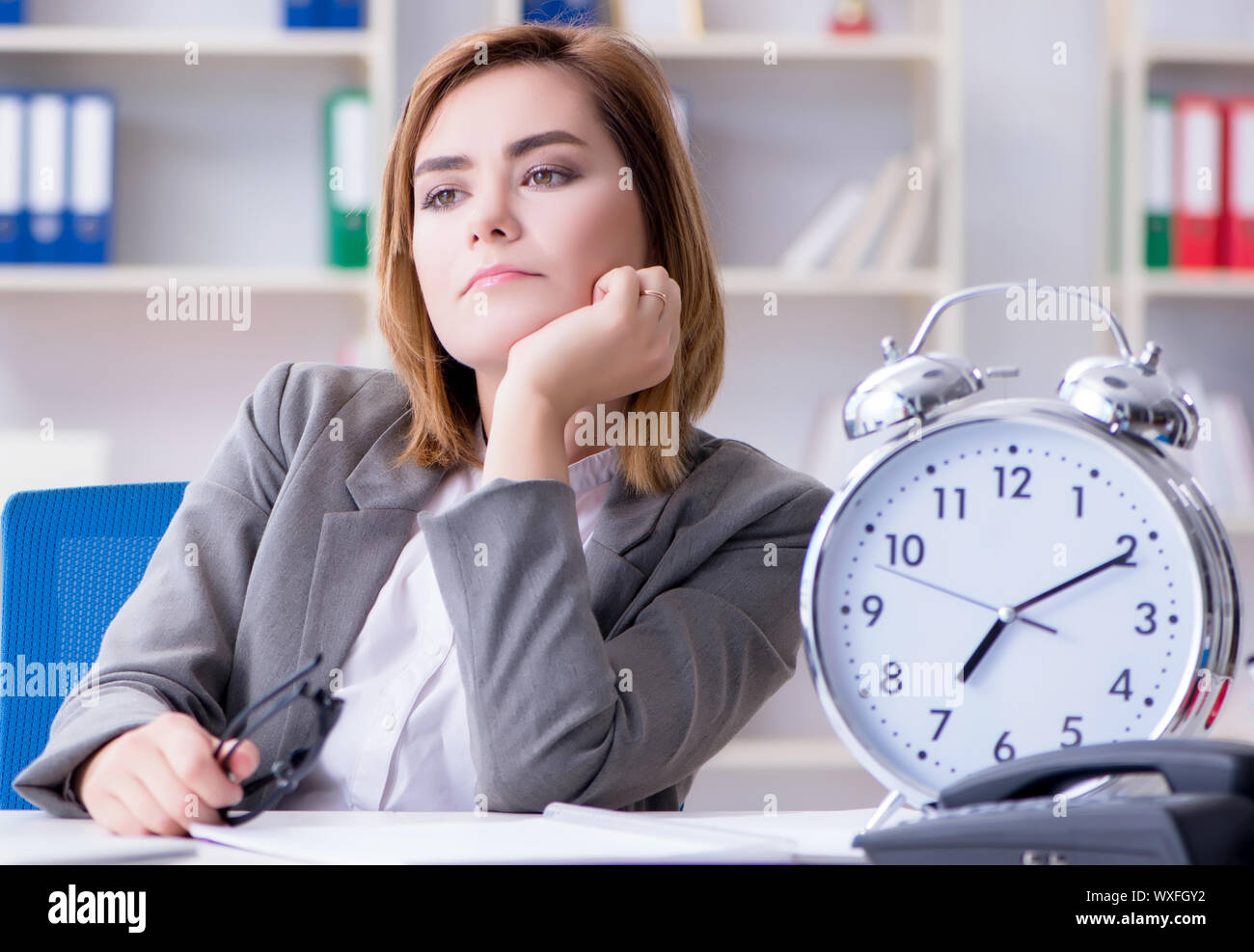 Businesswoman working in the office Stock Photo - Alamy