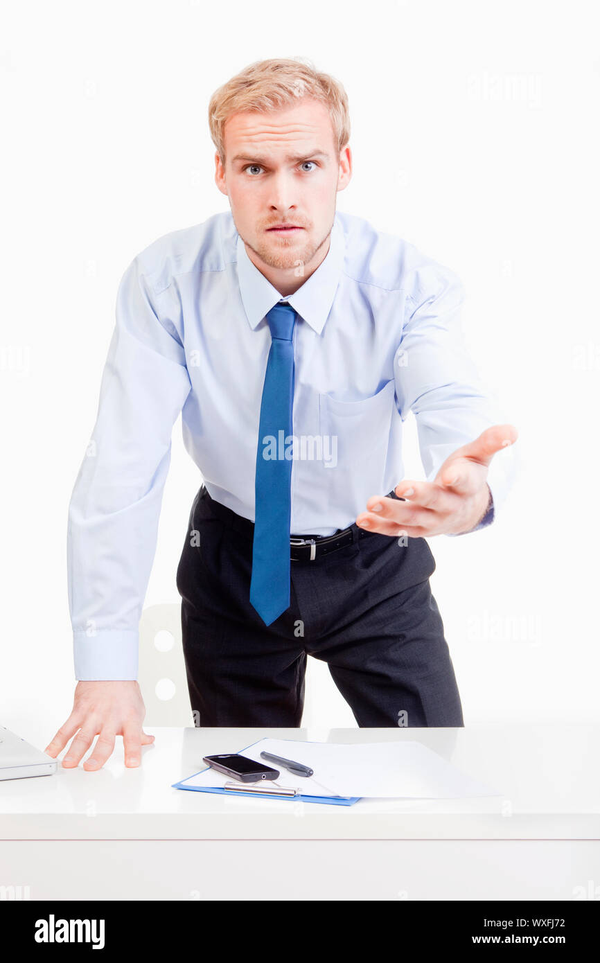 Angry boss standing behind desk hi-res stock photography and images - Alamy
