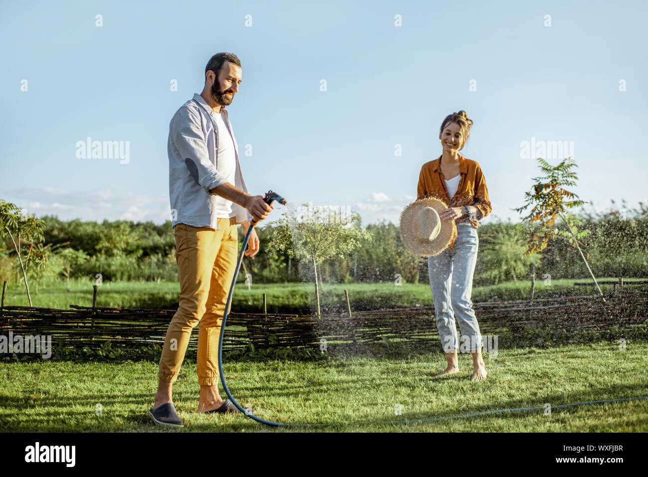 Taking care beautiful green lawn hi-res stock photography and images ...