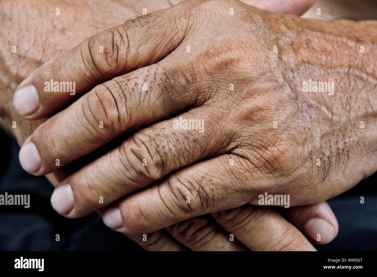 Rough hands hi-res stock photography and images - Alamy