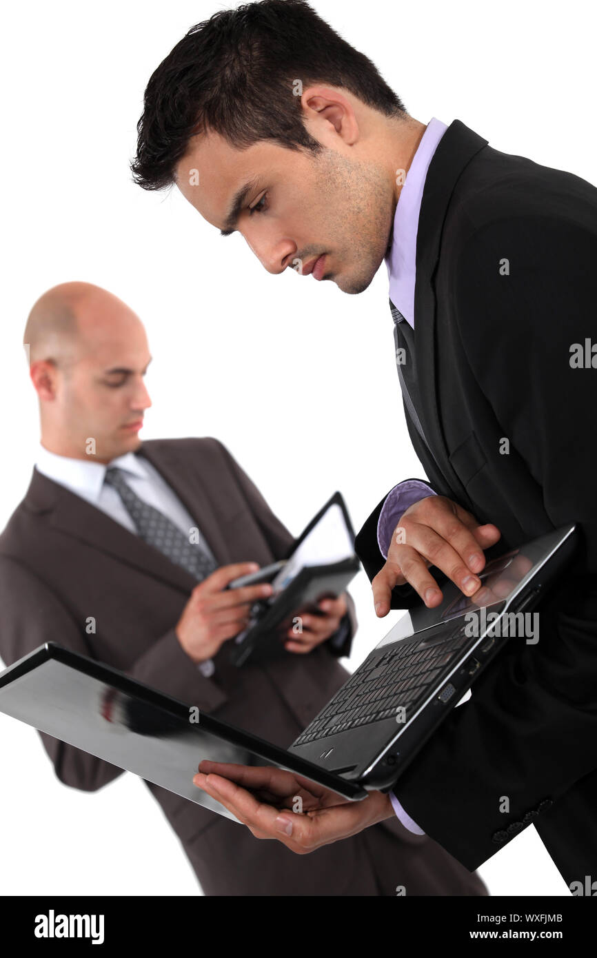 Two dynamic businessmen Stock Photo - Alamy