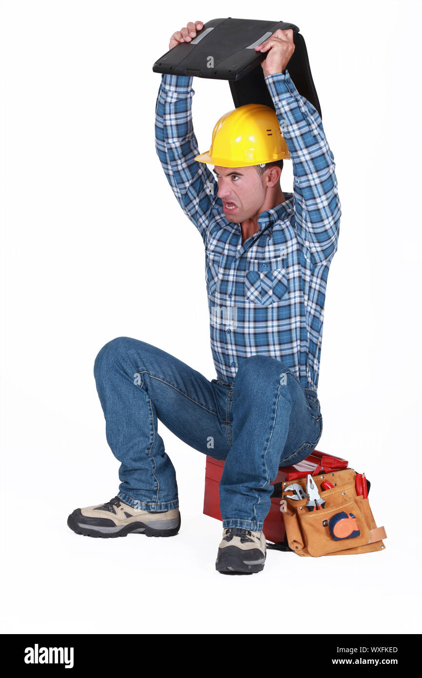 Anger throw laptop Stock Photo - Alamy