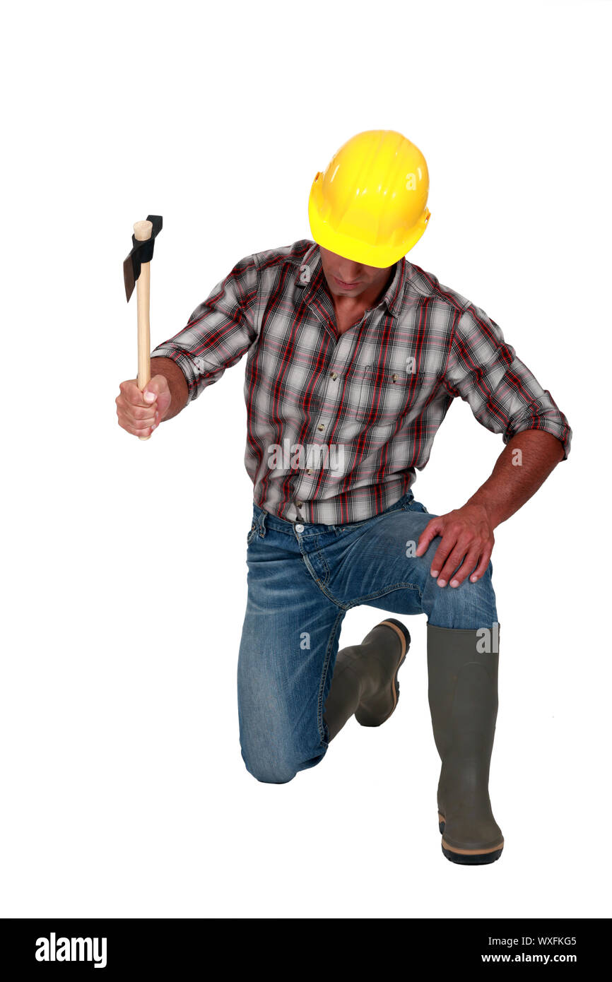 Construction worker working with axe hi-res stock photography and ...