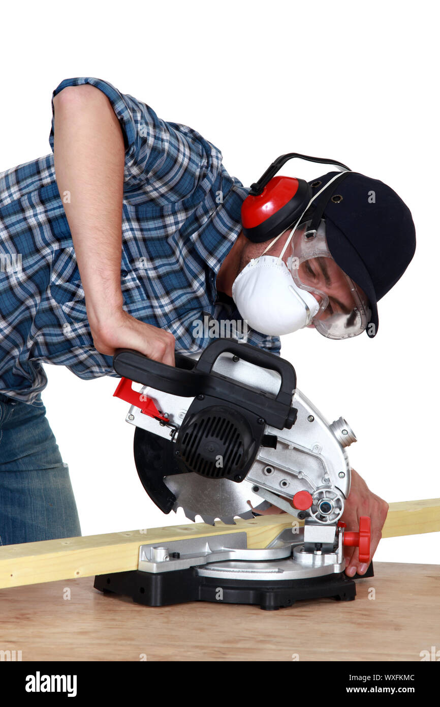 Man using a circular saw Stock Photo - Alamy