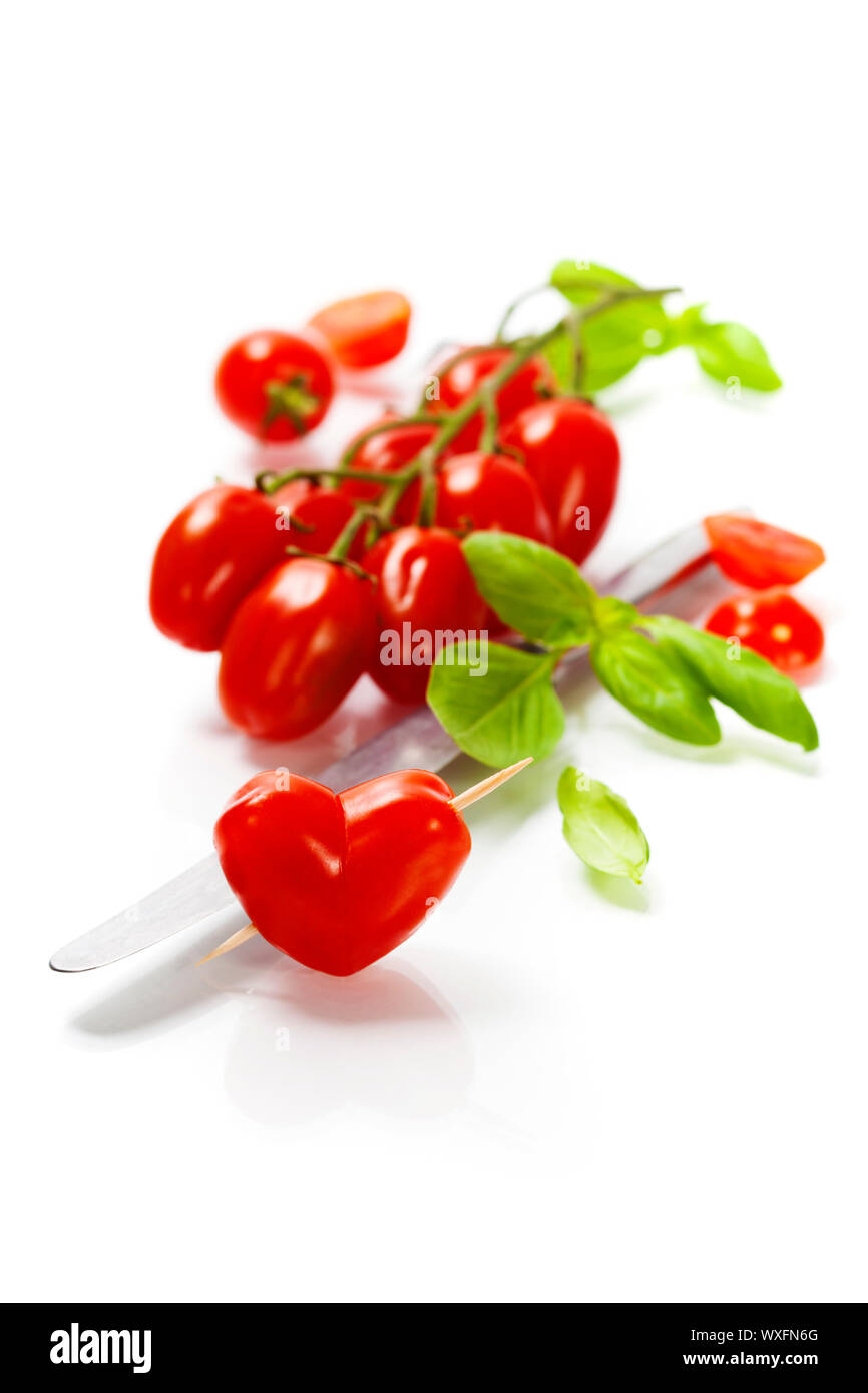 tomato heart - healthy eating concept Stock Photo - Alamy