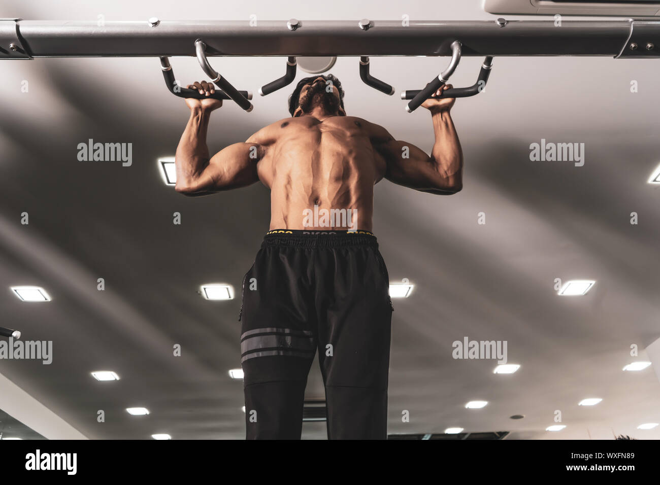 Male bodybuilder flexing his biceps hi-res stock photography and images ...
