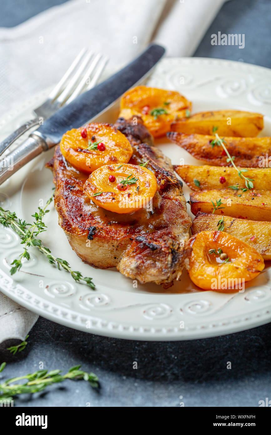 Entrecote of pork with apricots and thyme Stock Photo - Alamy