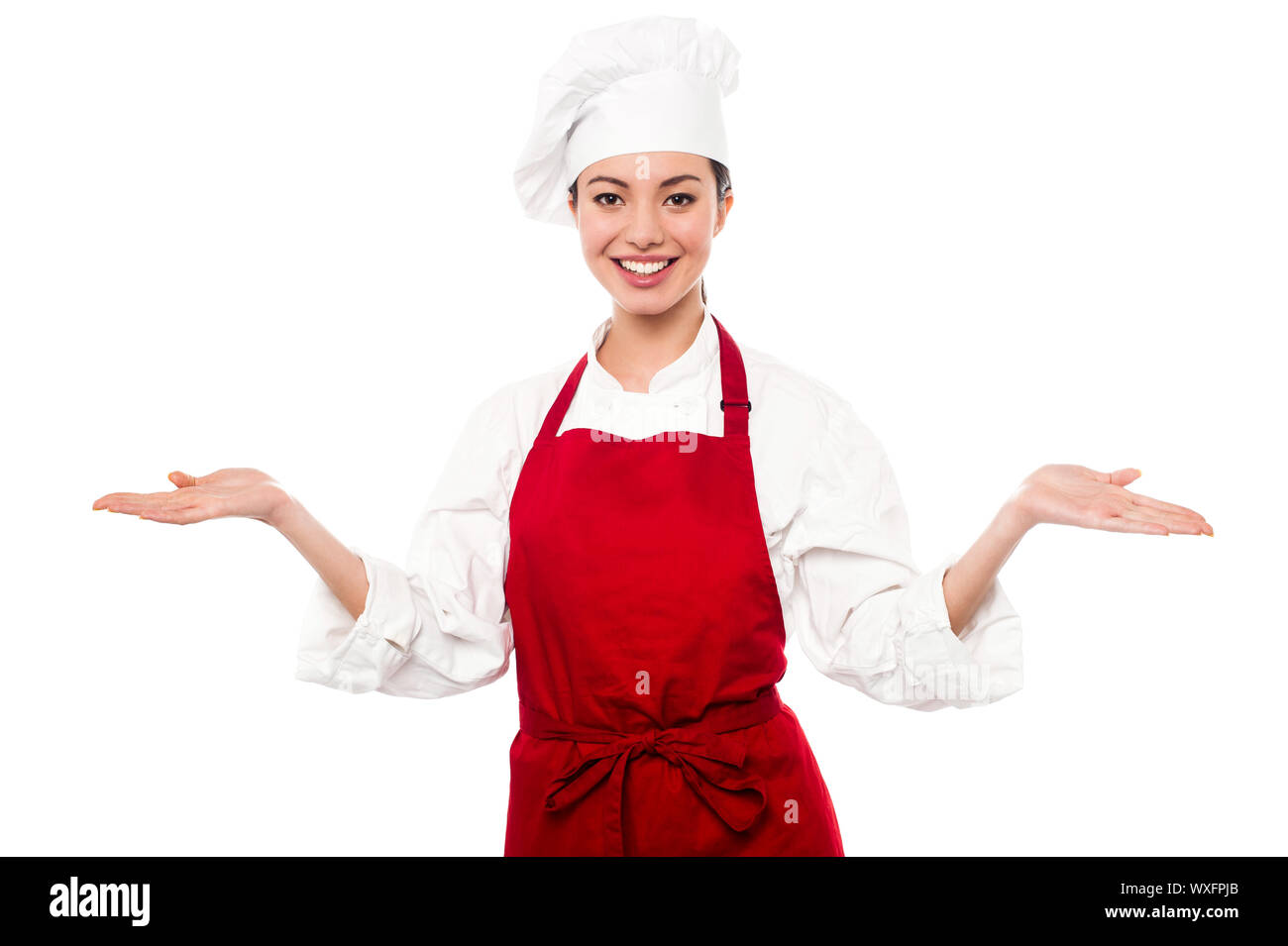 Female chef standing with open palms, warm welcome gesture Stock Photo ...