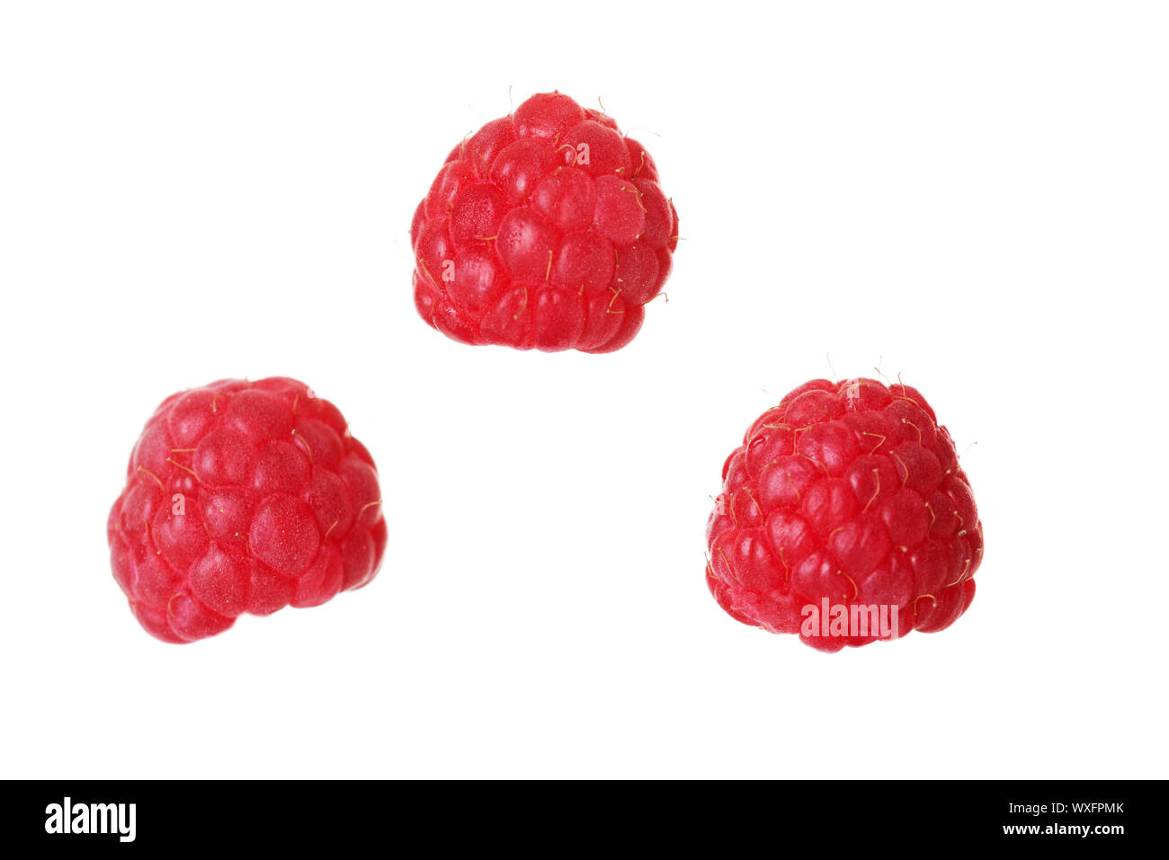 Raspberries isolated on white background Stock Photo - Alamy
