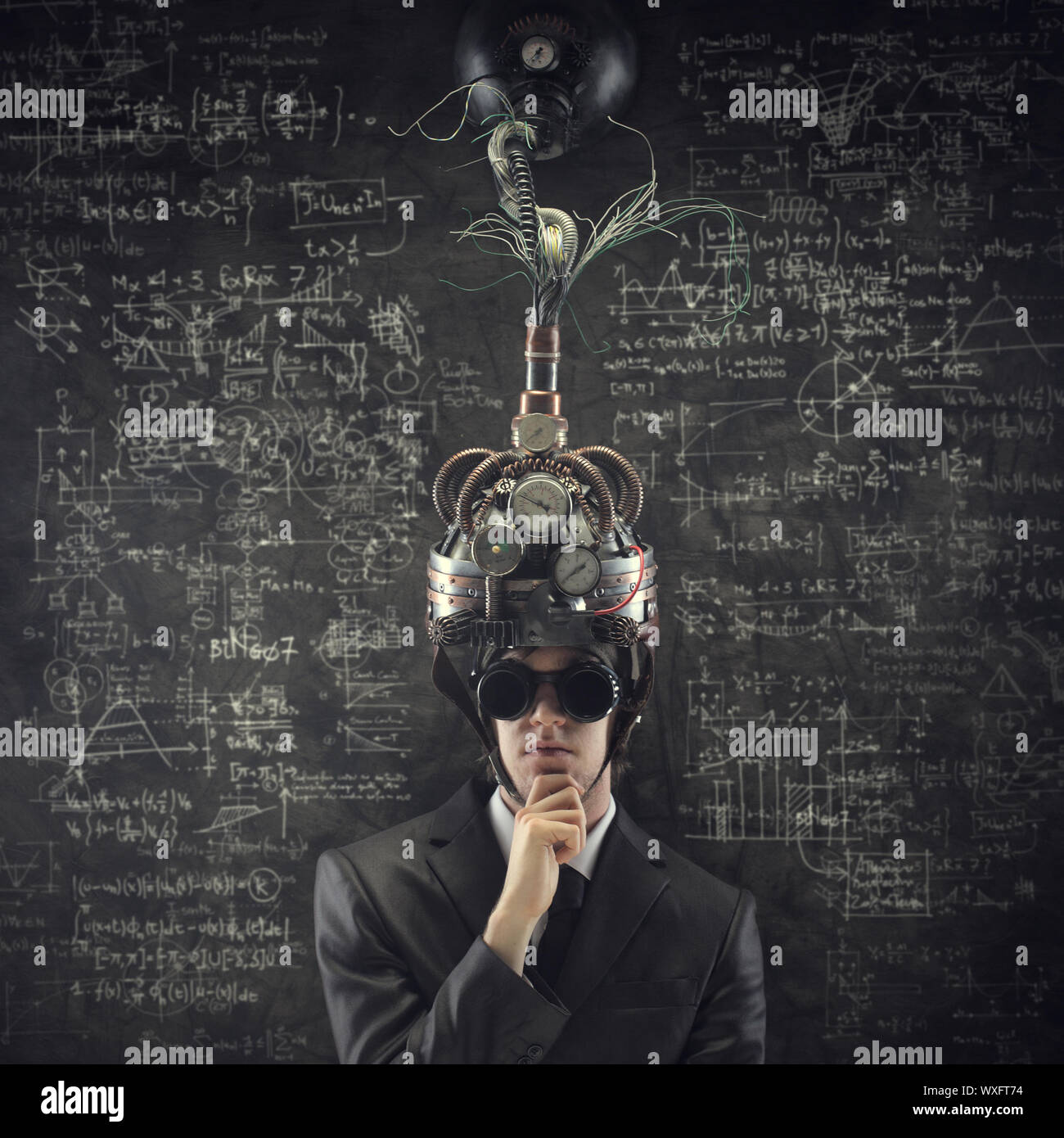 Business solutions: man wearing a brain-control helmet Stock Photo - Alamy