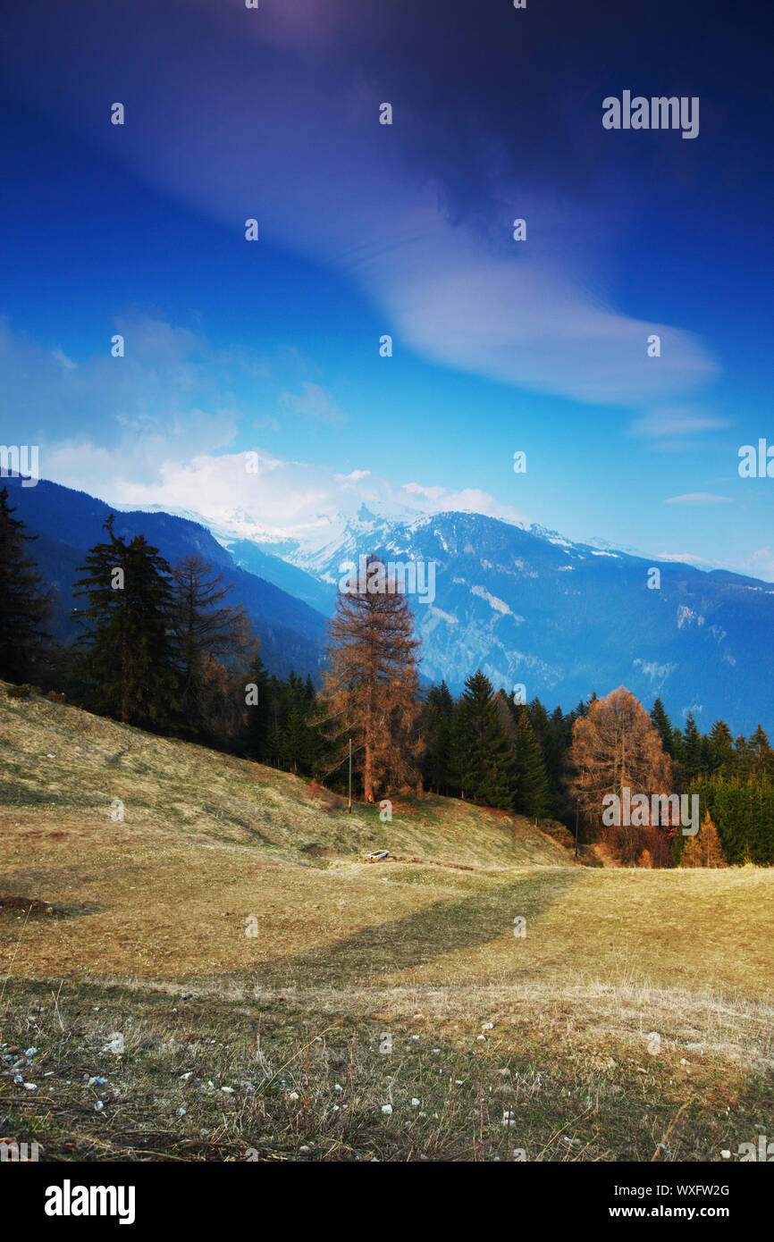 spring alps mountains scene background Stock Photo - Alamy