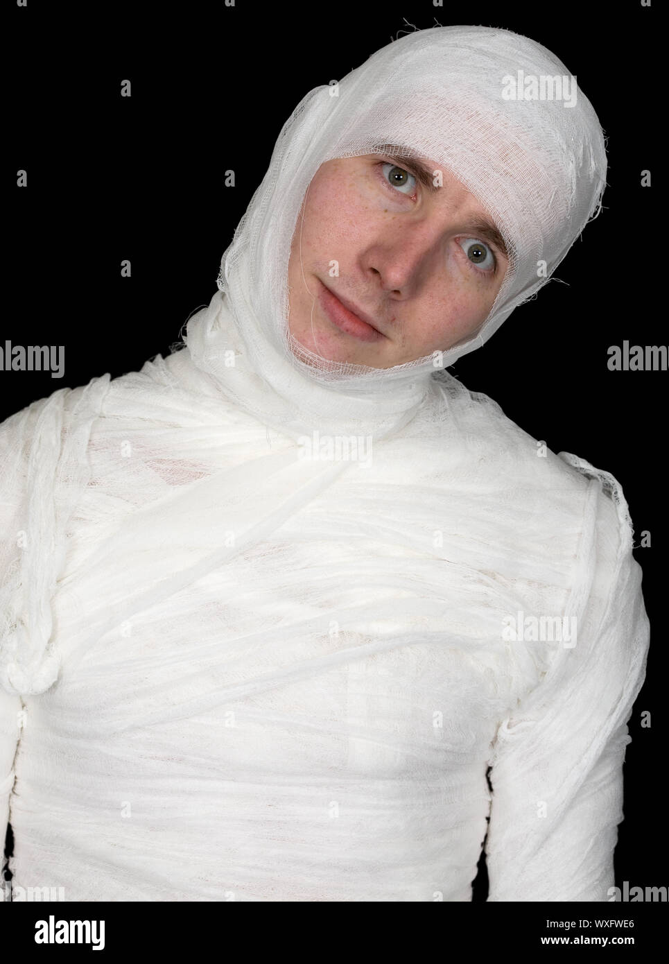 Man in bandage on the black background Stock Photo - Alamy