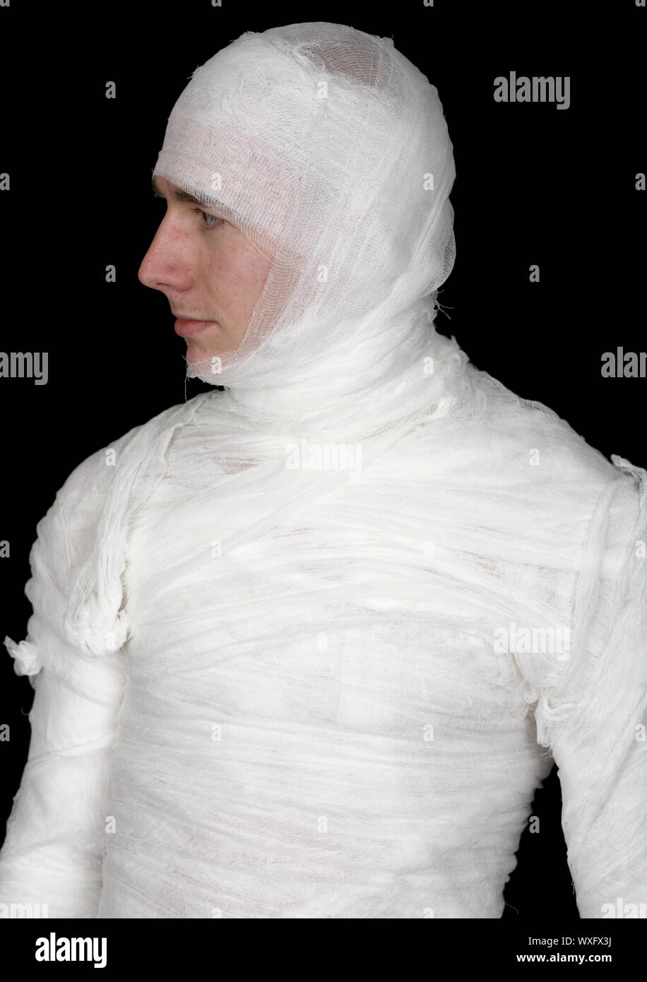 Man in bandage on the black background Stock Photo - Alamy
