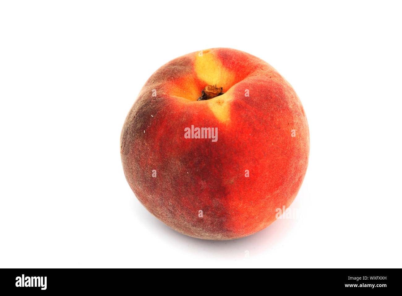 one peach isolated on white Stock Photo - Alamy