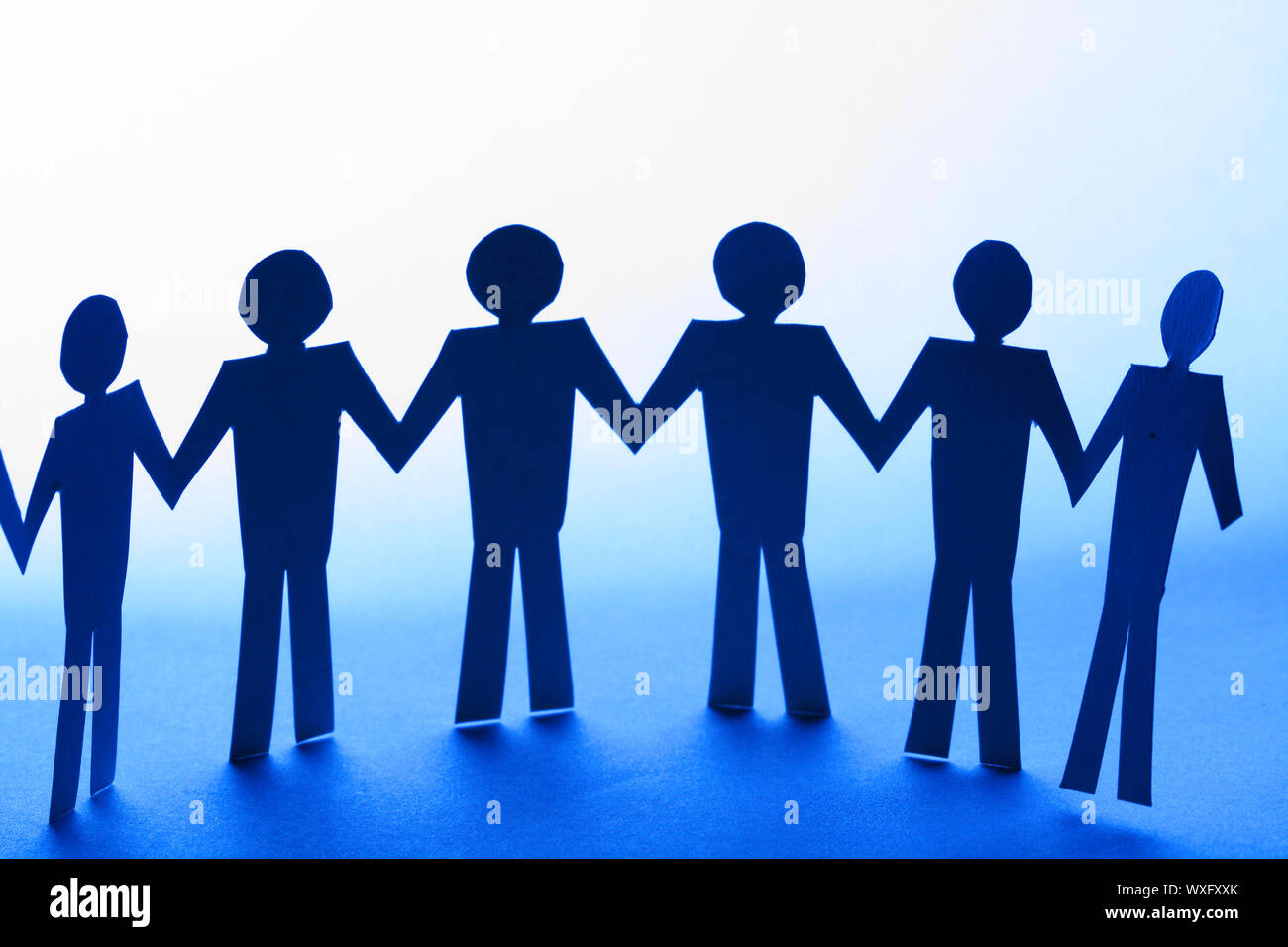 Teamwork concept human paper doll hi-res stock photography and images ...