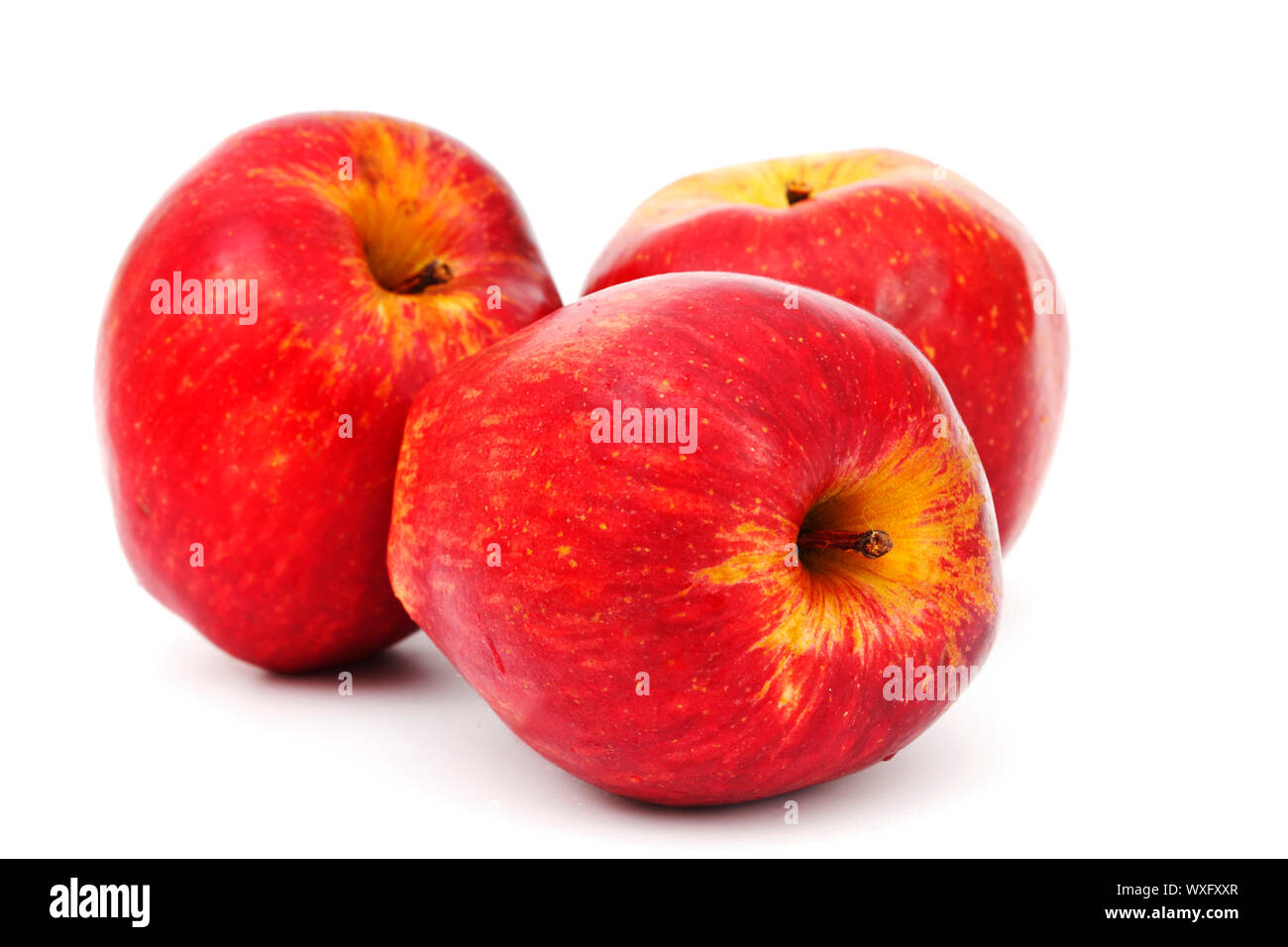 red apples pile isolated on white Stock Photo - Alamy