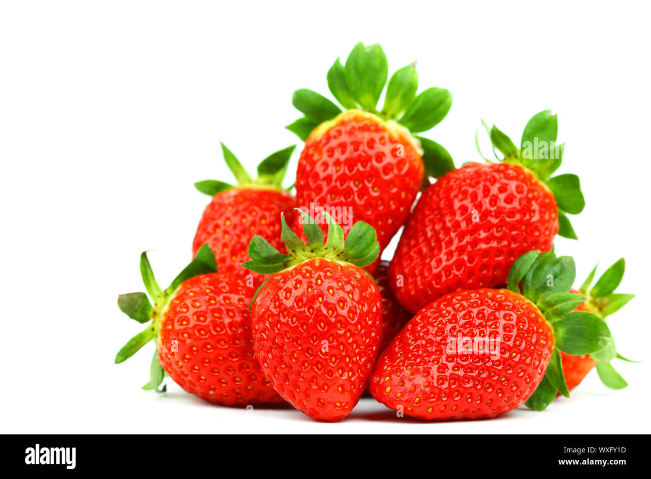 strawberry pile isolated on white background Stock Photo - Alamy