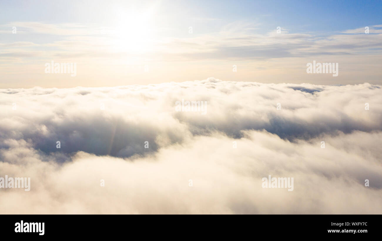 Aerial view White clouds in blue sky. Top view. View from drone. Aerial bird's eye view. Aerial ...
