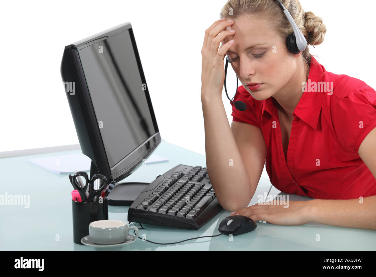 Stressed call-center operative Stock Photo - Alamy