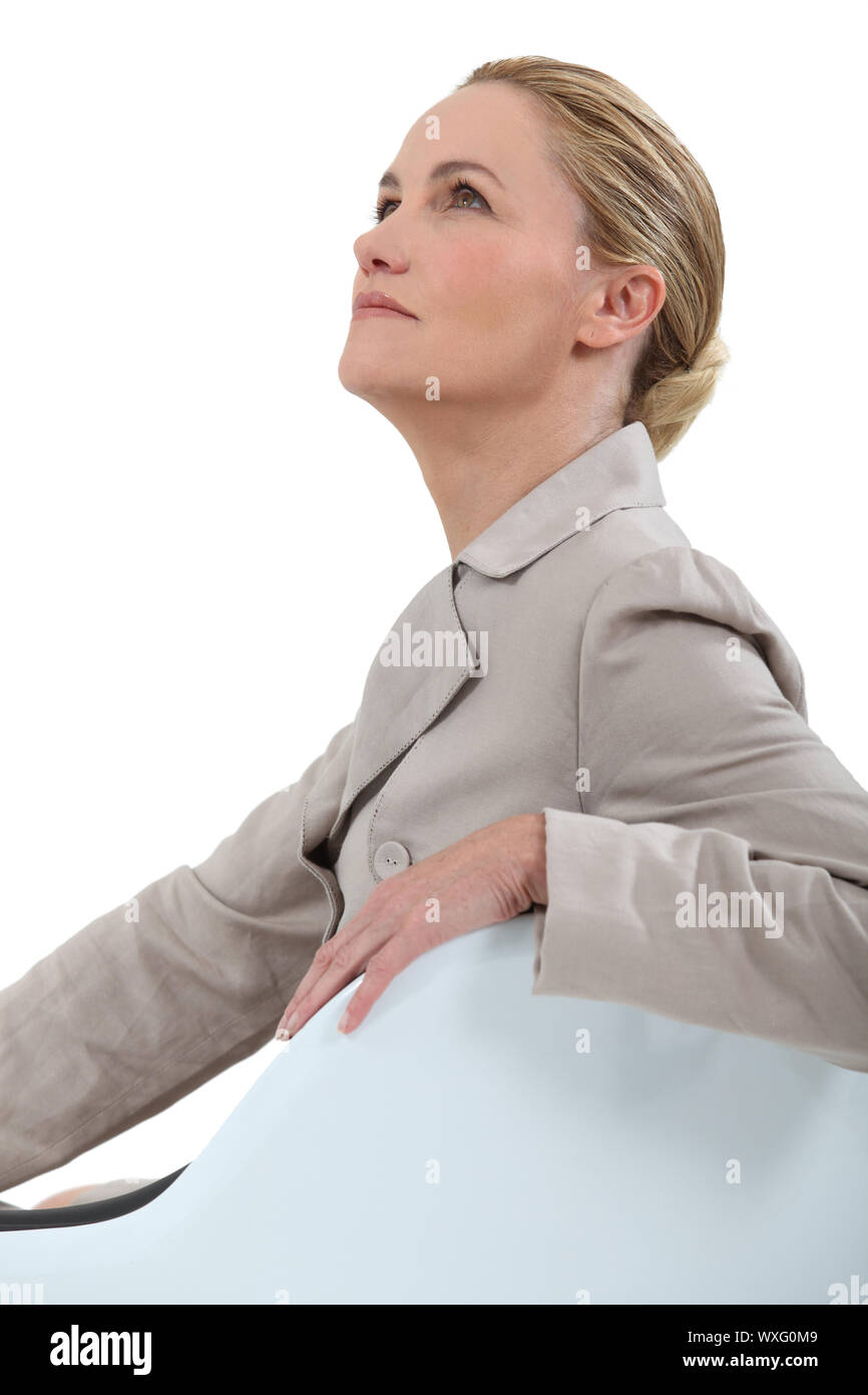 woman on chair Stock Photo - Alamy