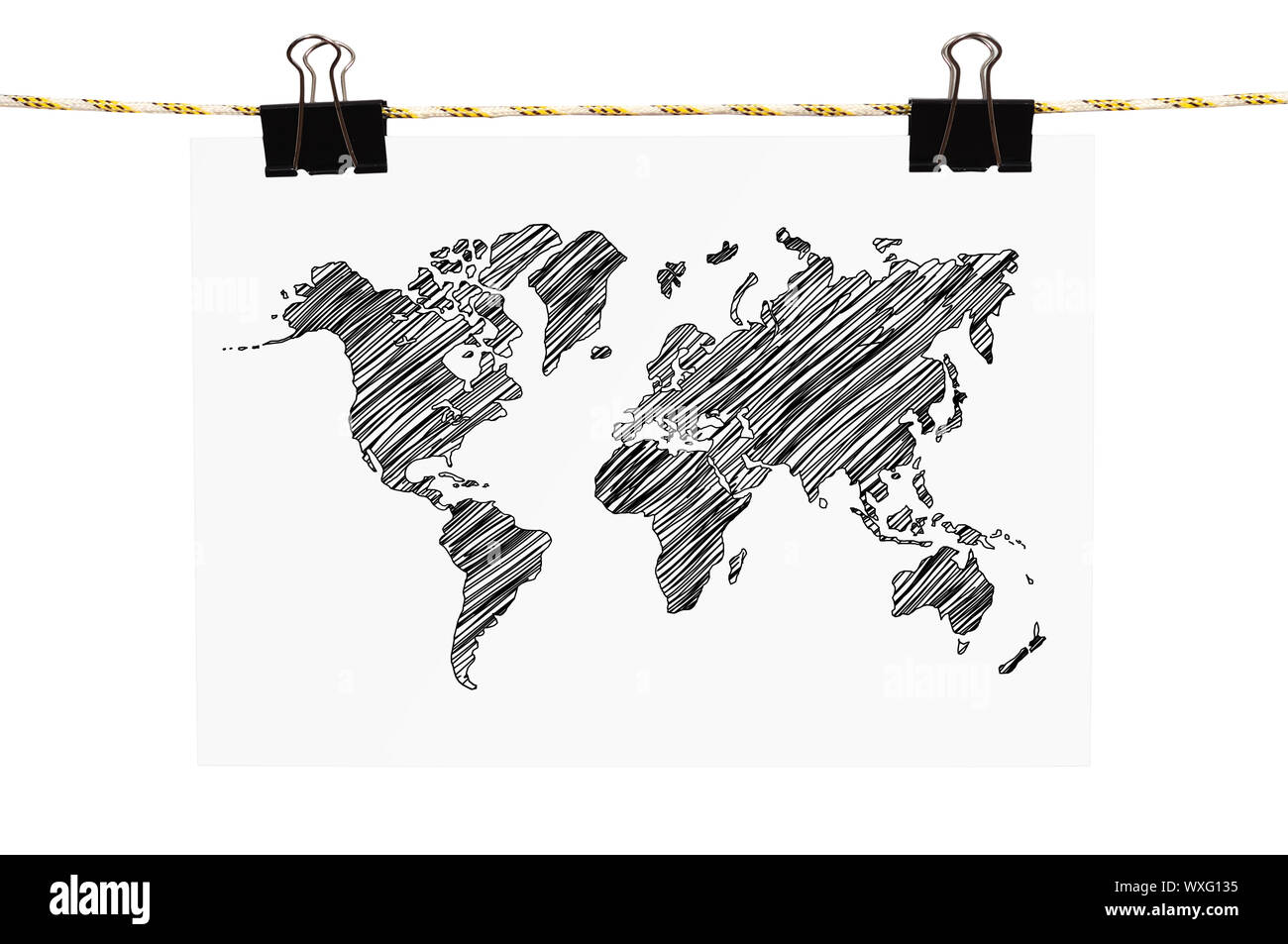 poster with world map hanging on a rope Stock Photo - Alamy
