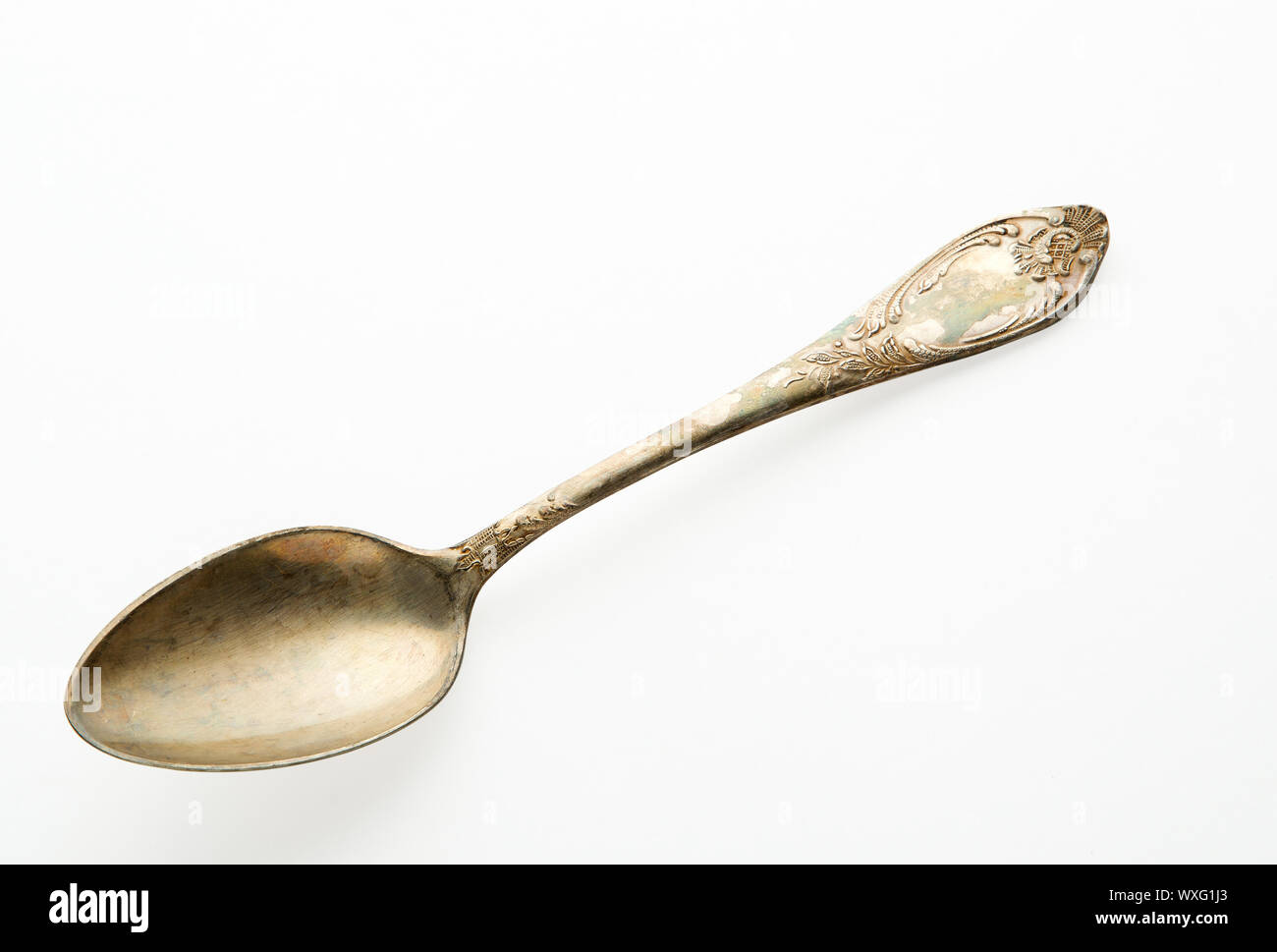 Spoon on isolate. Old empty spoon of an isolated surface Stock Photo ...