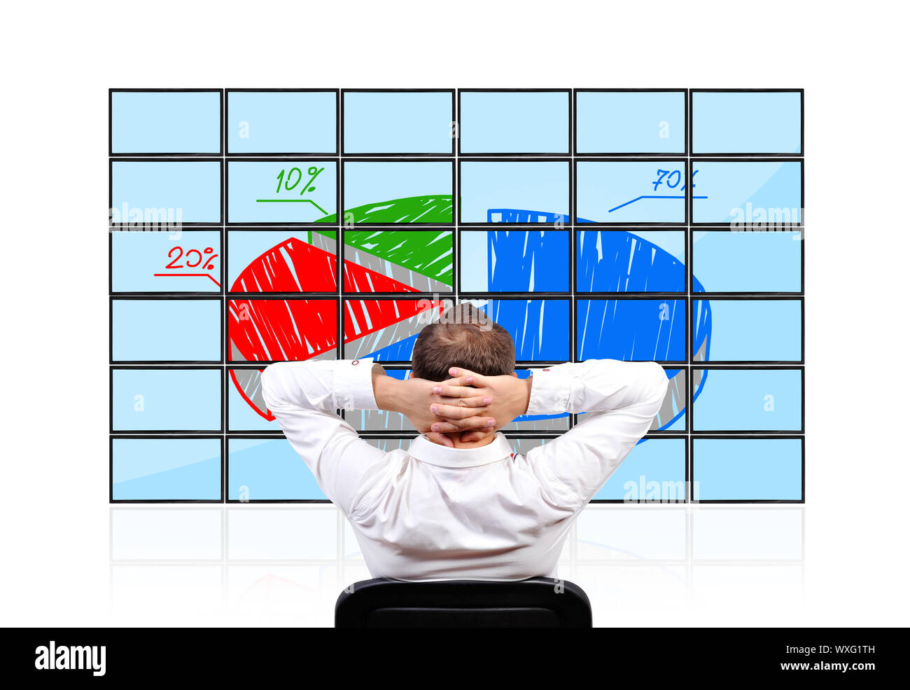 man looking on flat panels with growth chart Stock Photo - Alamy