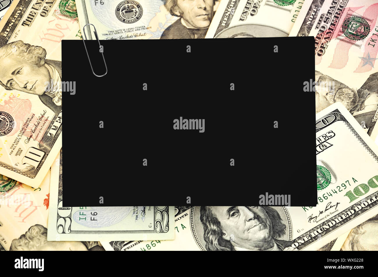 black paper on money background Stock Photo - Alamy