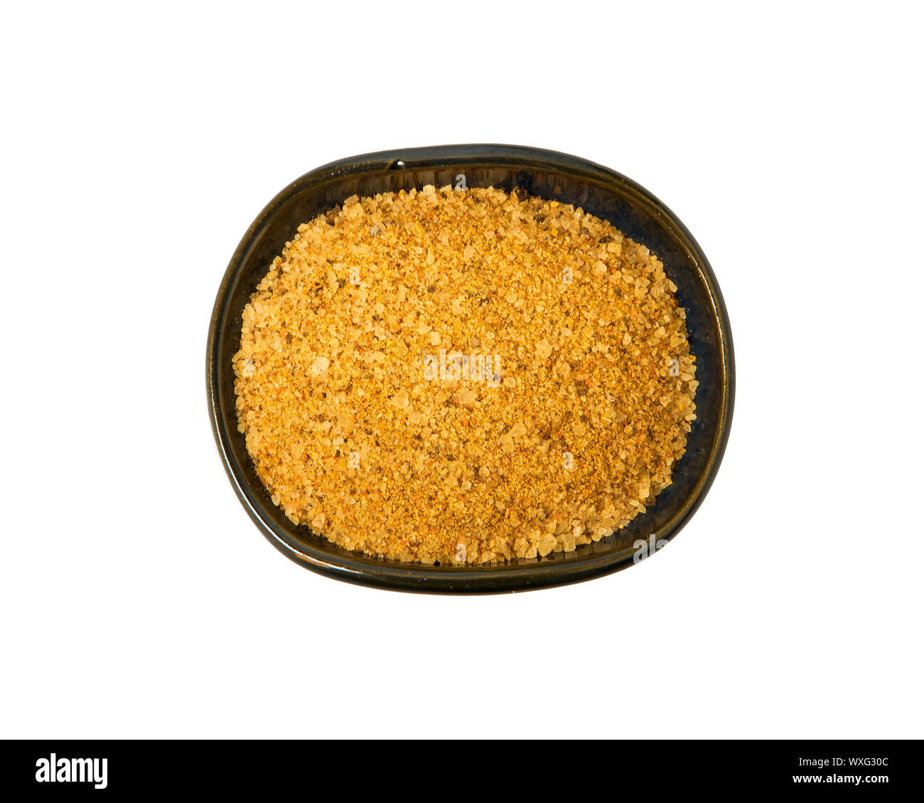 A mixture of seasonings in a bowl isolated on a white background. Spice ...