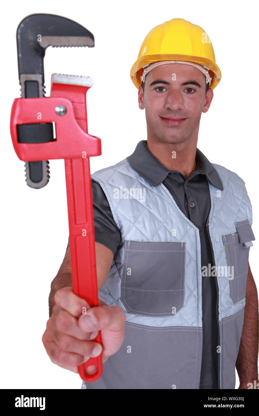 plumber showing spanner Stock Photo - Alamy