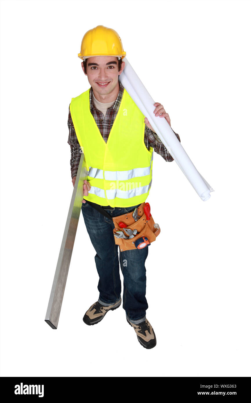 Young builder with plans Stock Photo - Alamy