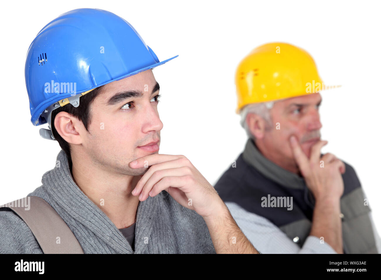 Two pensive construction workers Stock Photo - Alamy