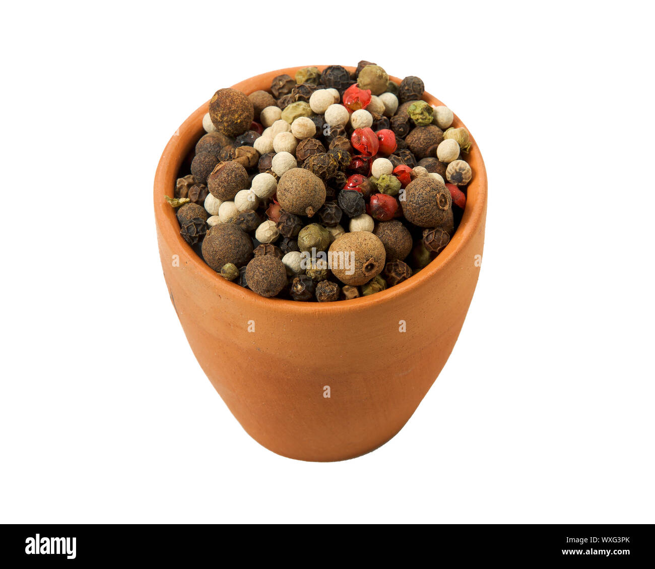 A mixture of peppers in a bowl on isolate. View from above. Seasoning ...