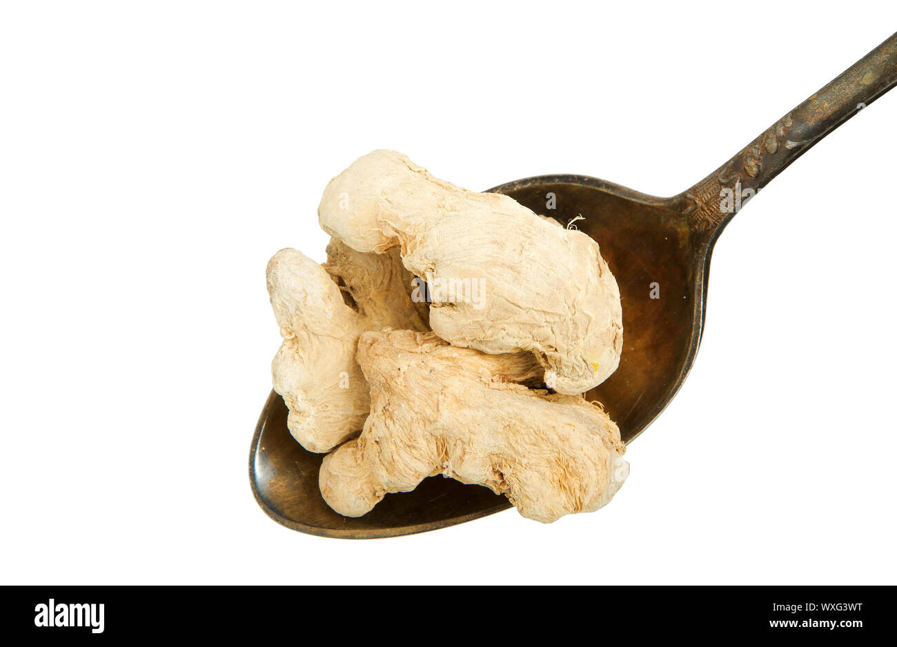Ginger root in a spoon isolated on a white background. Seasoning on ...
