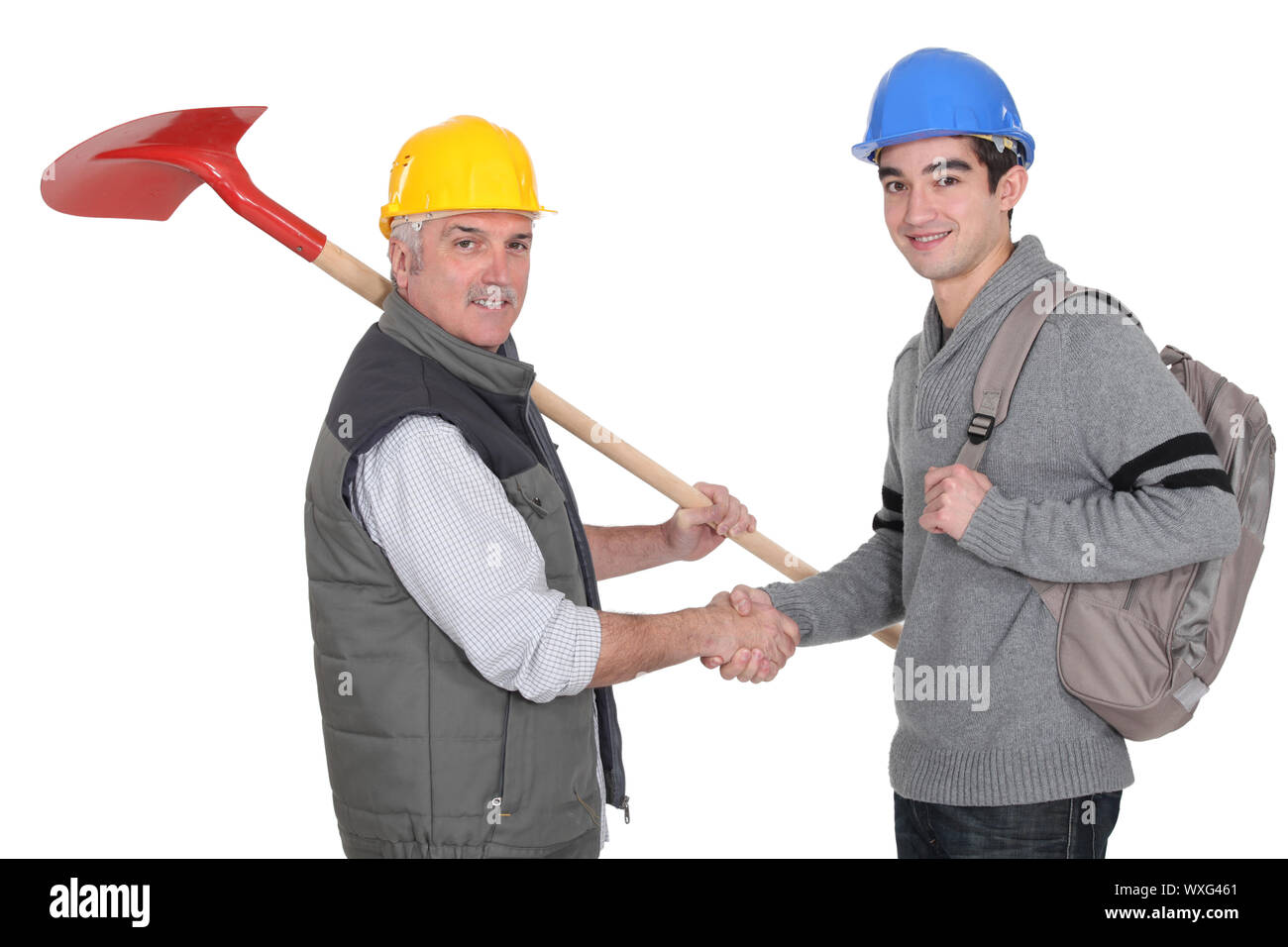 craftsman and apprentice shaking hands Stock Photo - Alamy