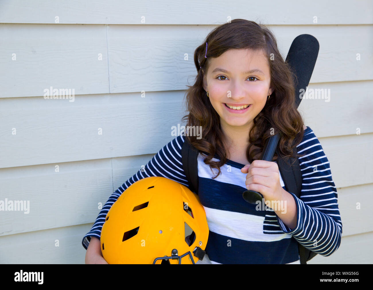 Teenage girl playing baseball hi-res stock photography and images - Alamy