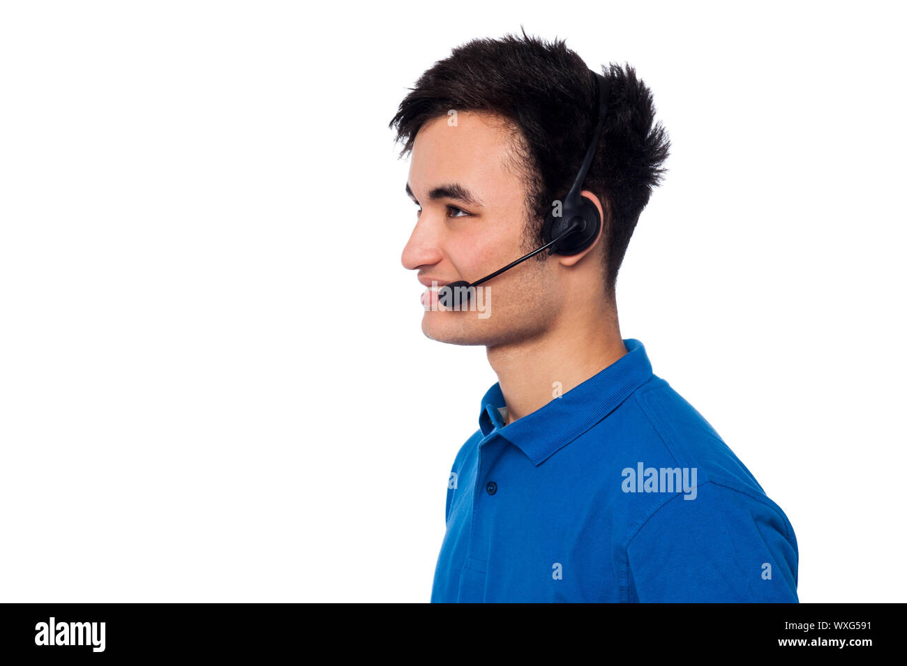 Photo of a handsome guy speaking through microphone Stock Photo - Alamy