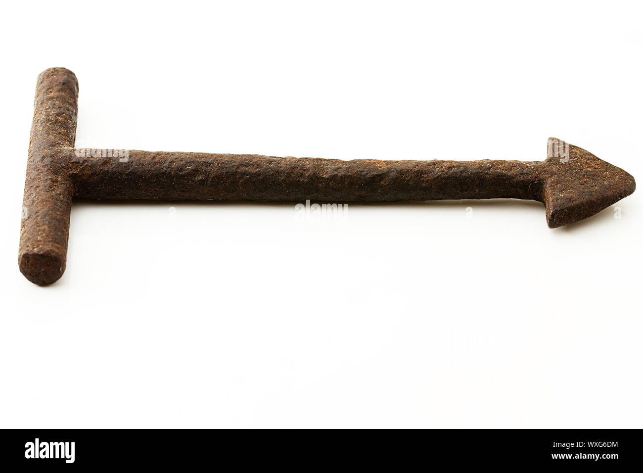 old rusty triangle key on white background Stock Photo - Alamy